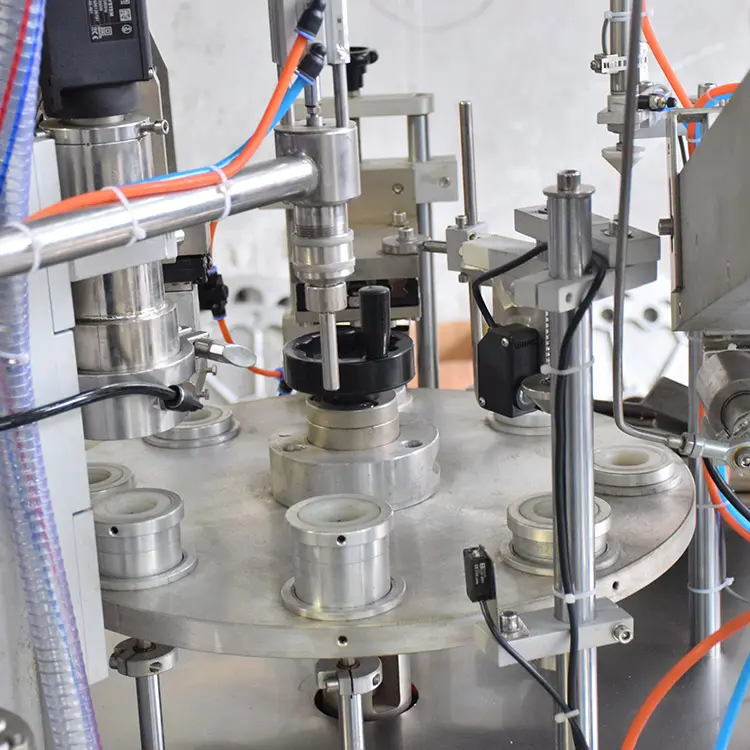 Tube Filling & Sealing Machine - Qualipakmachines.com