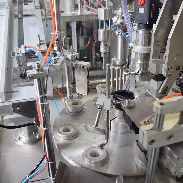 Tube Filling & Sealing Machine - Qualipakmachines.com